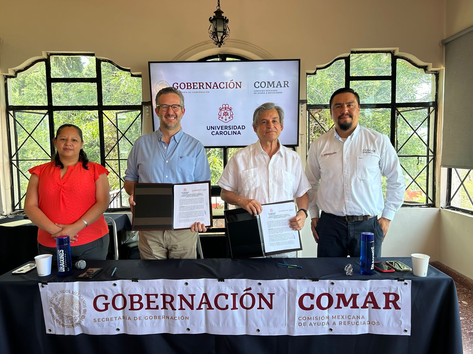 Firman Carta de Intención Universidad Carolina y COMAR